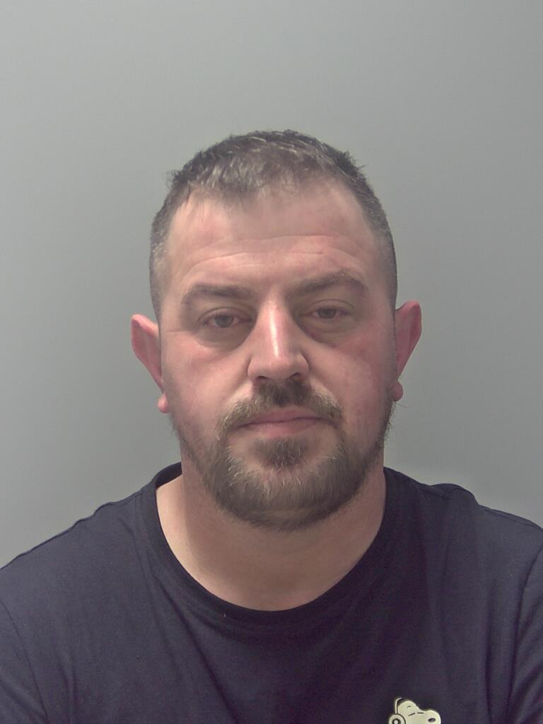 Drug dealer who crashed car while two officers hung onto side jailed ...
